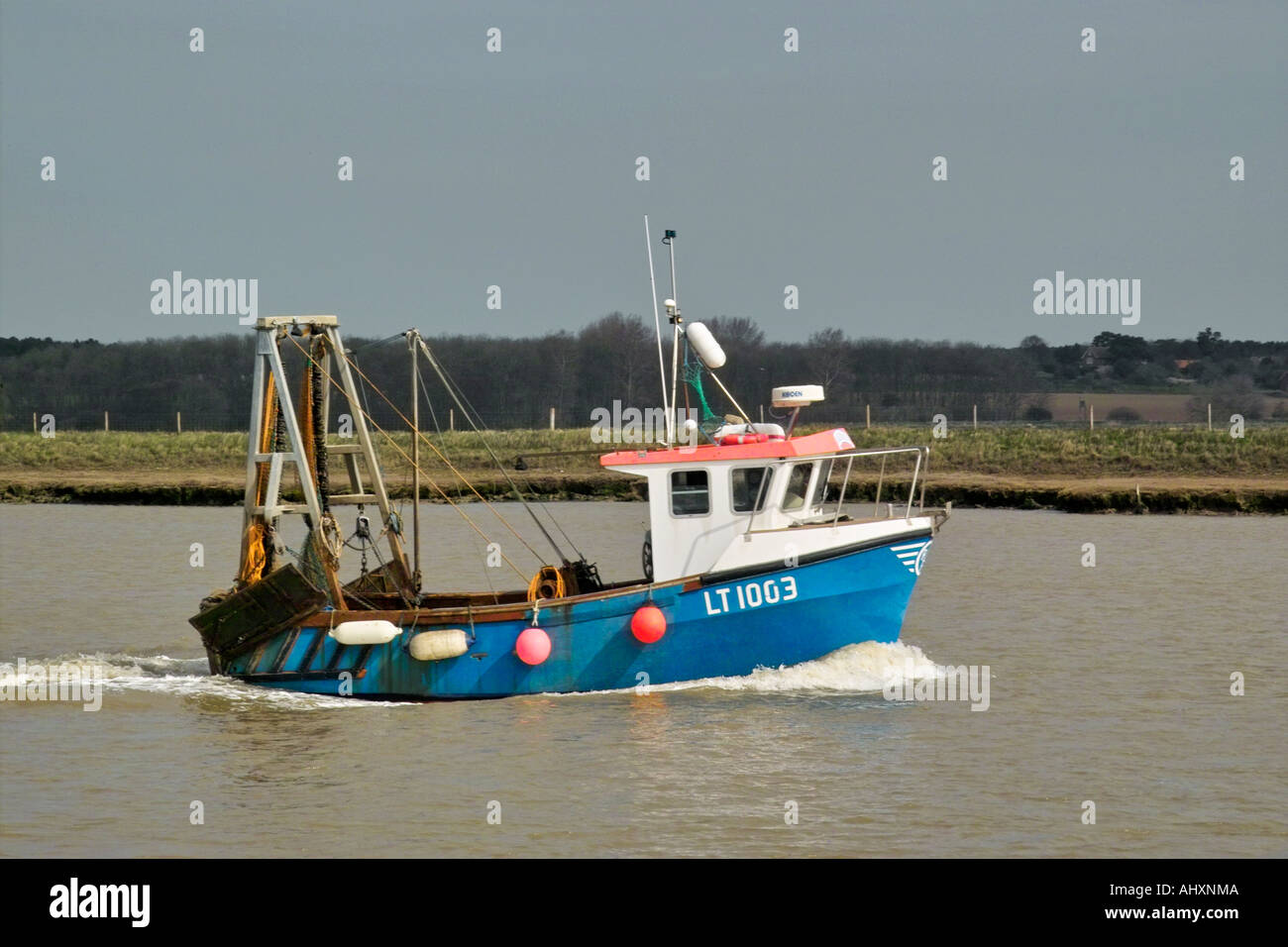 Small fishing trawler on the River Alde, Suffolk, East Anglia Stock ...