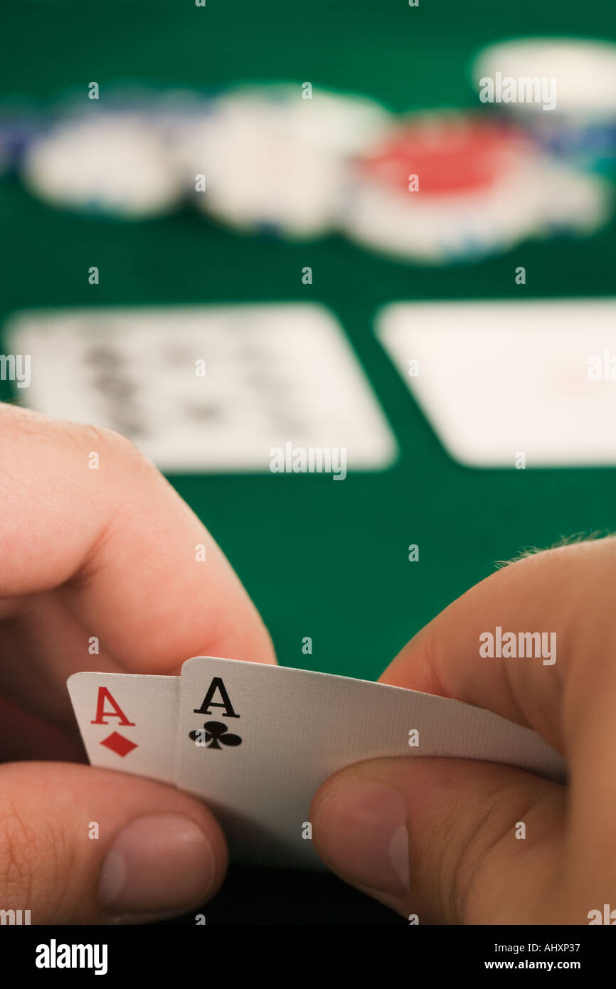 Hand holding two aces Stock Photo - Alamy
