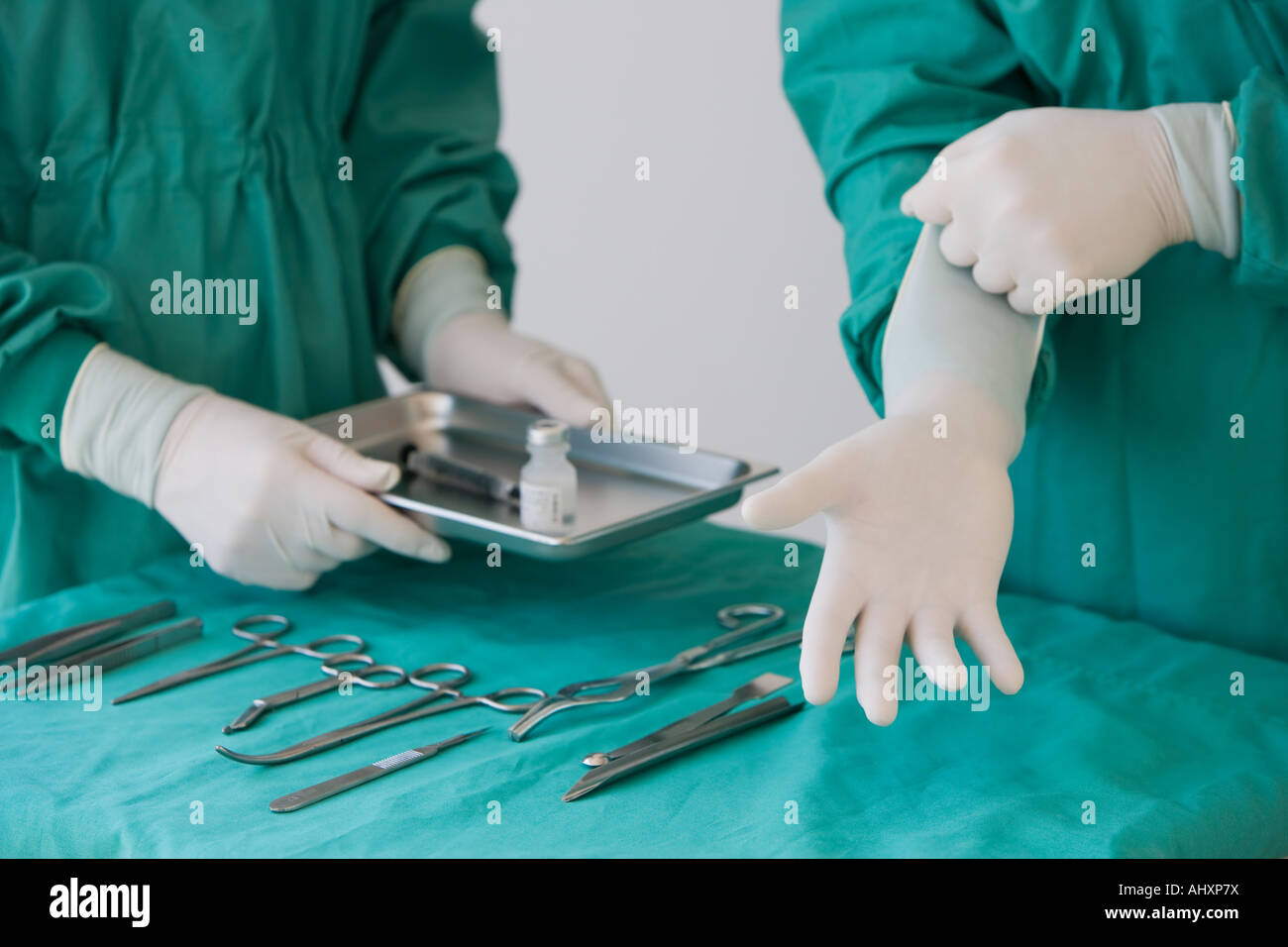 Doctor holding tray of medical instruments Stock Photo - Alamy