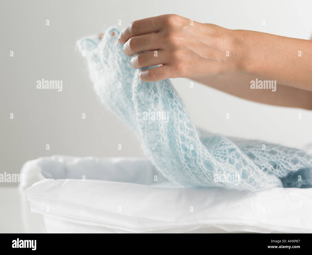 Garments packing hi-res stock photography and images - Alamy