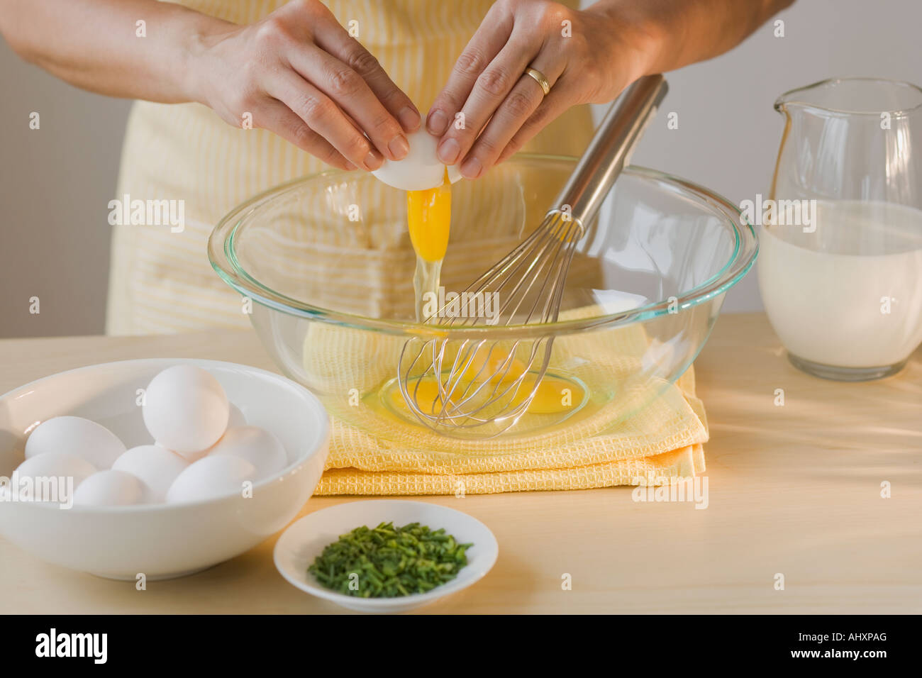 Woman whisking milk in hi-res stock photography and images - Alamy