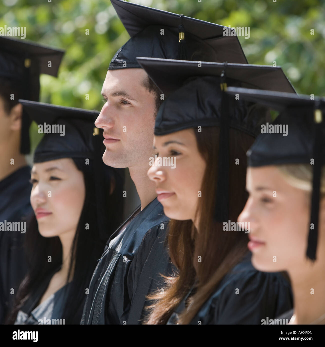 Group of college graduates in row Stock Photo - Alamy