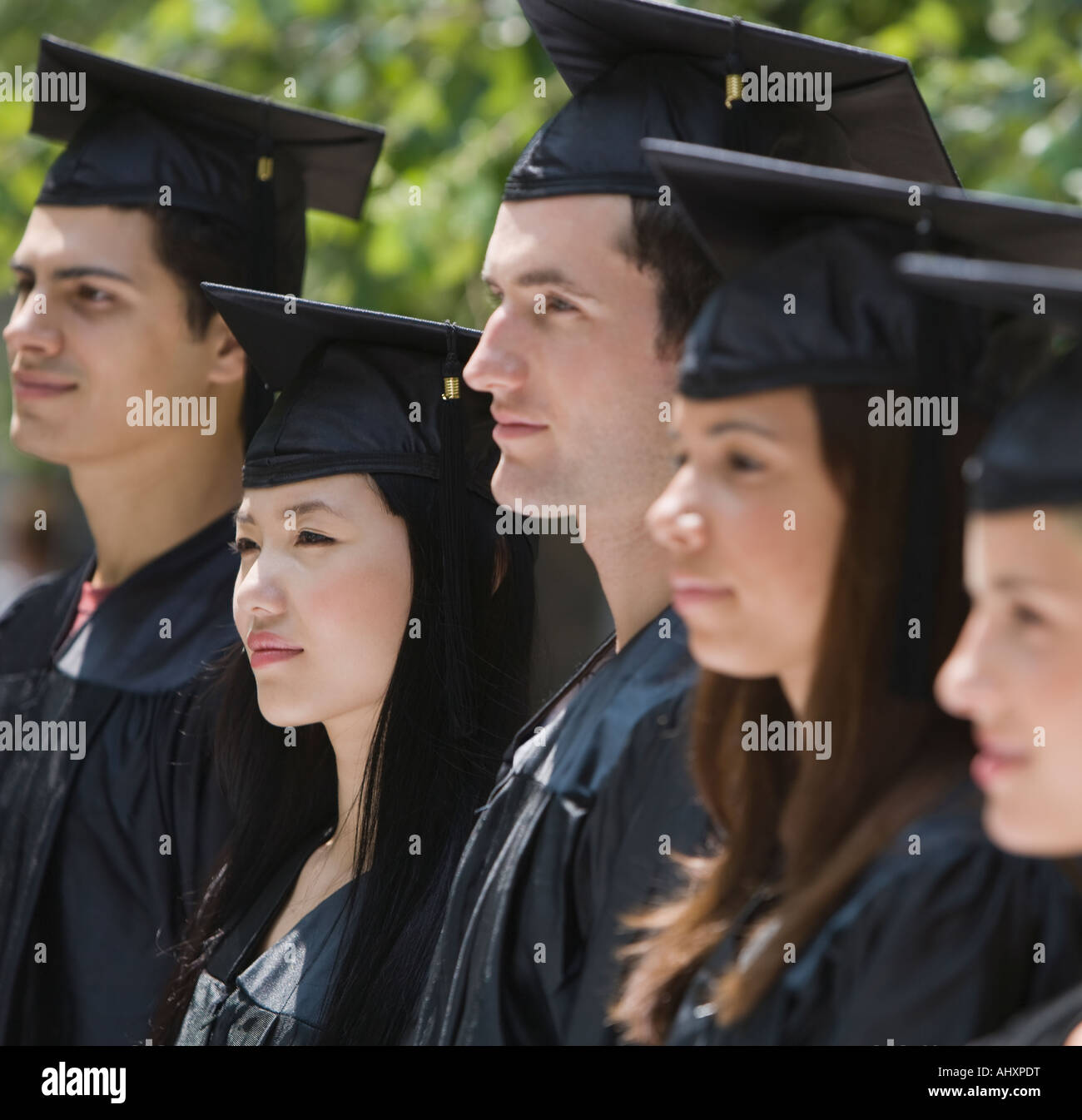 Group of college graduates in row Stock Photo - Alamy