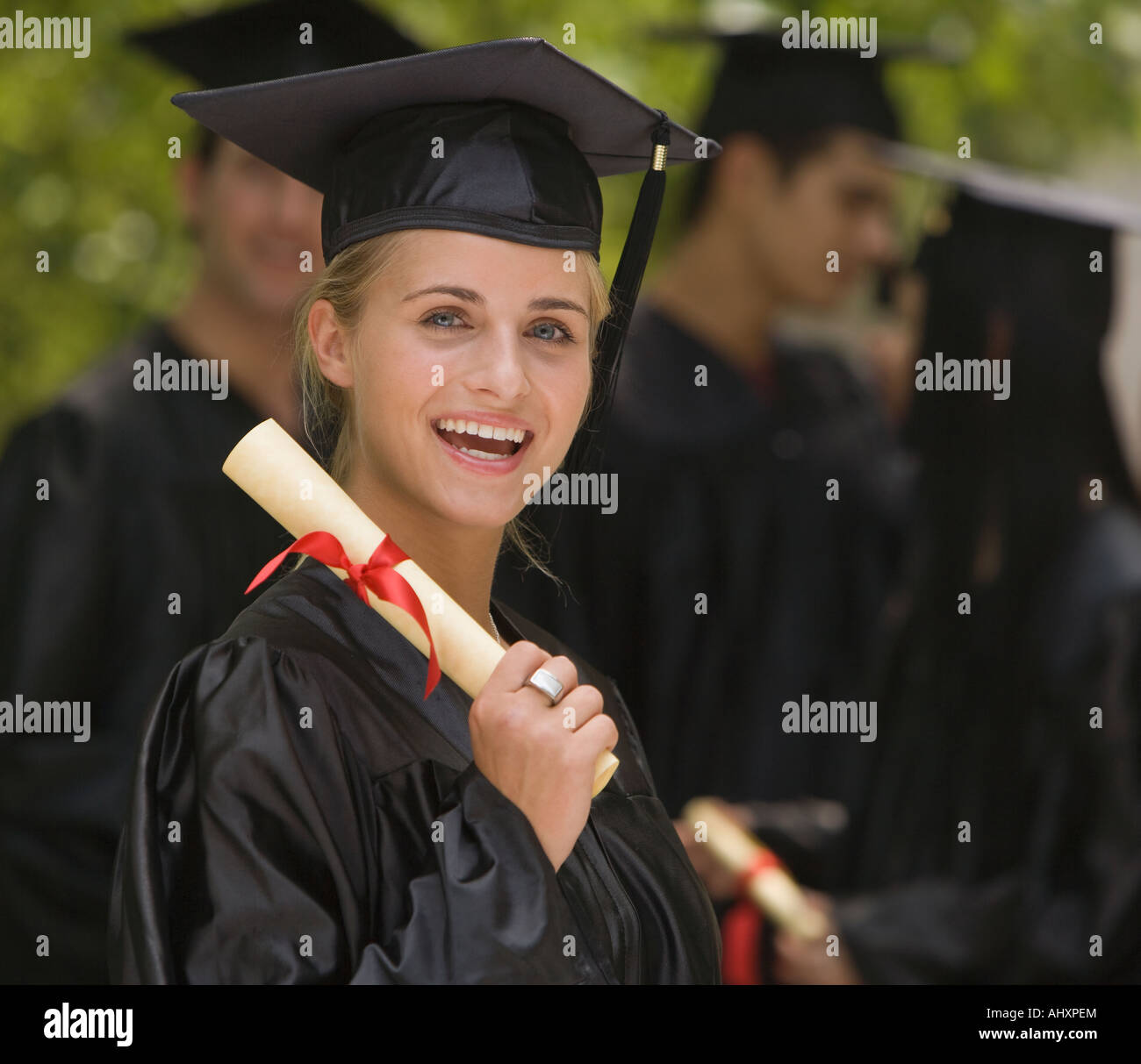 Portrait of female college graduate Stock Photo - Alamy