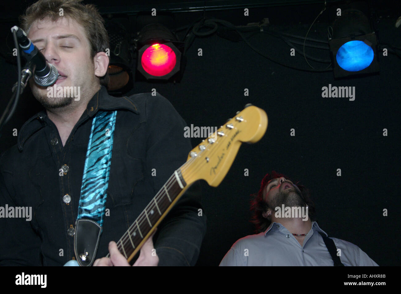 Rock band playing in a club Stock Photo - Alamy