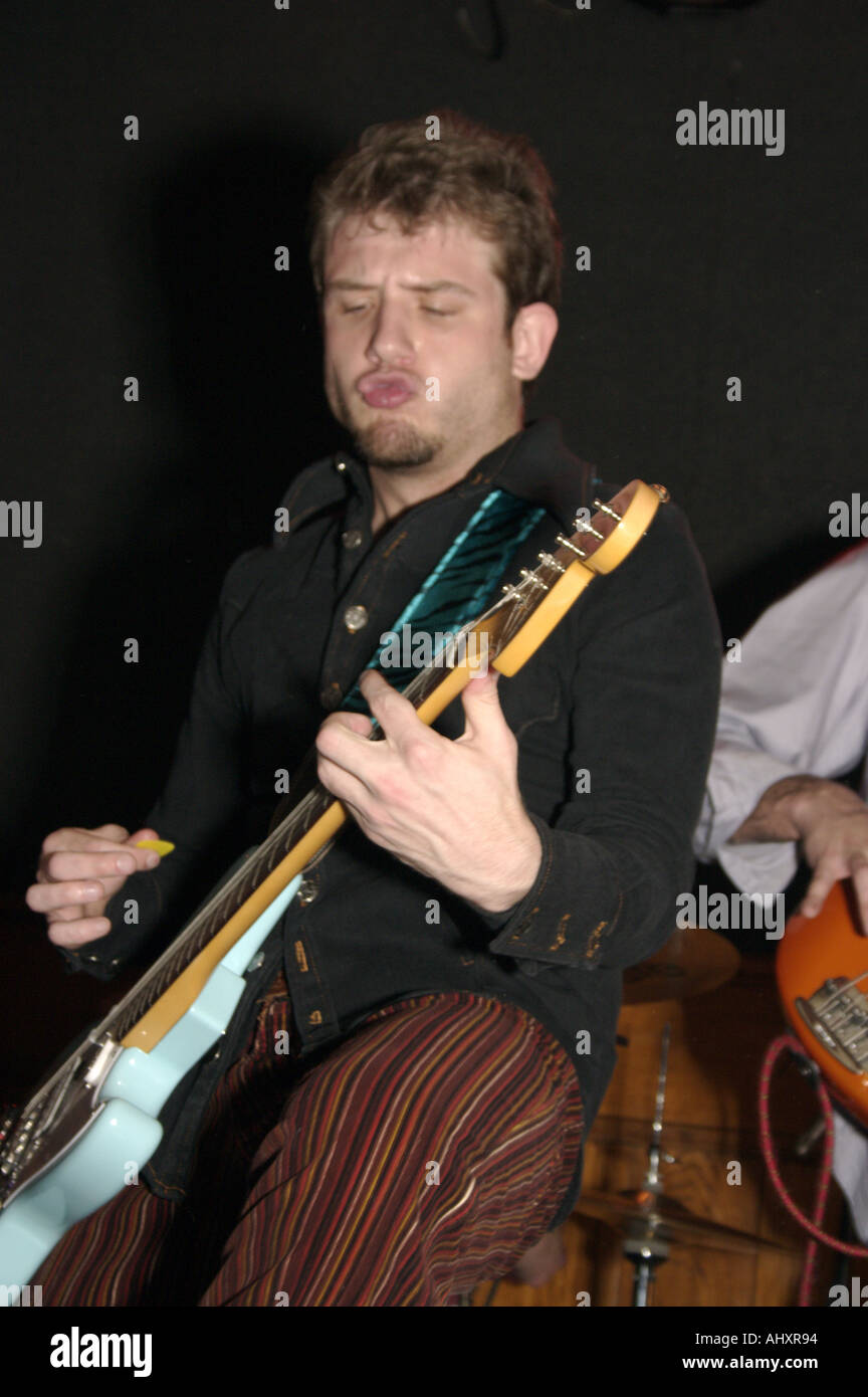 Rock band playing in a club Stock Photo - Alamy