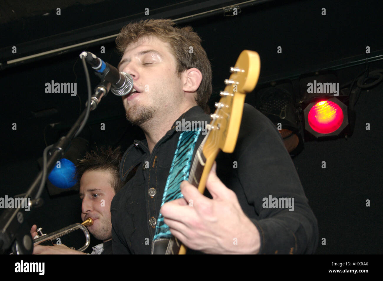 Rock band playing in a club Stock Photo - Alamy