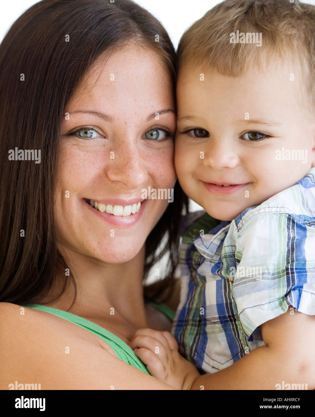 Mother hugging baby Stock Photo - Alamy