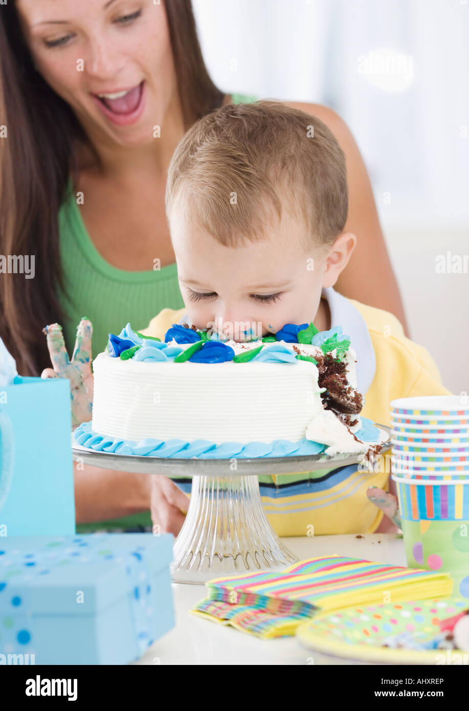 Baby eating birthday cake Stock Photo - Alamy