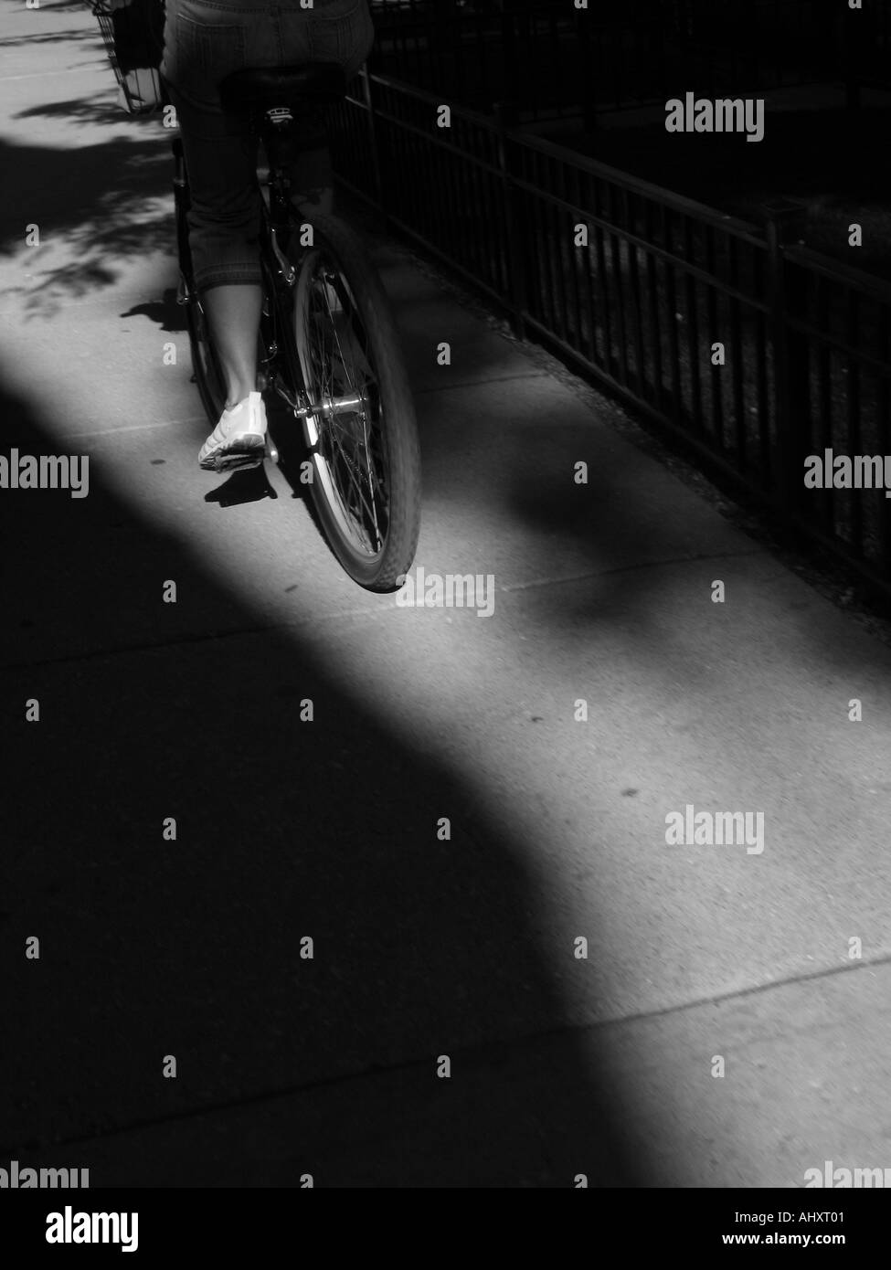 Person riding a bicycle Black and White Stock Photos & Images - Alamy