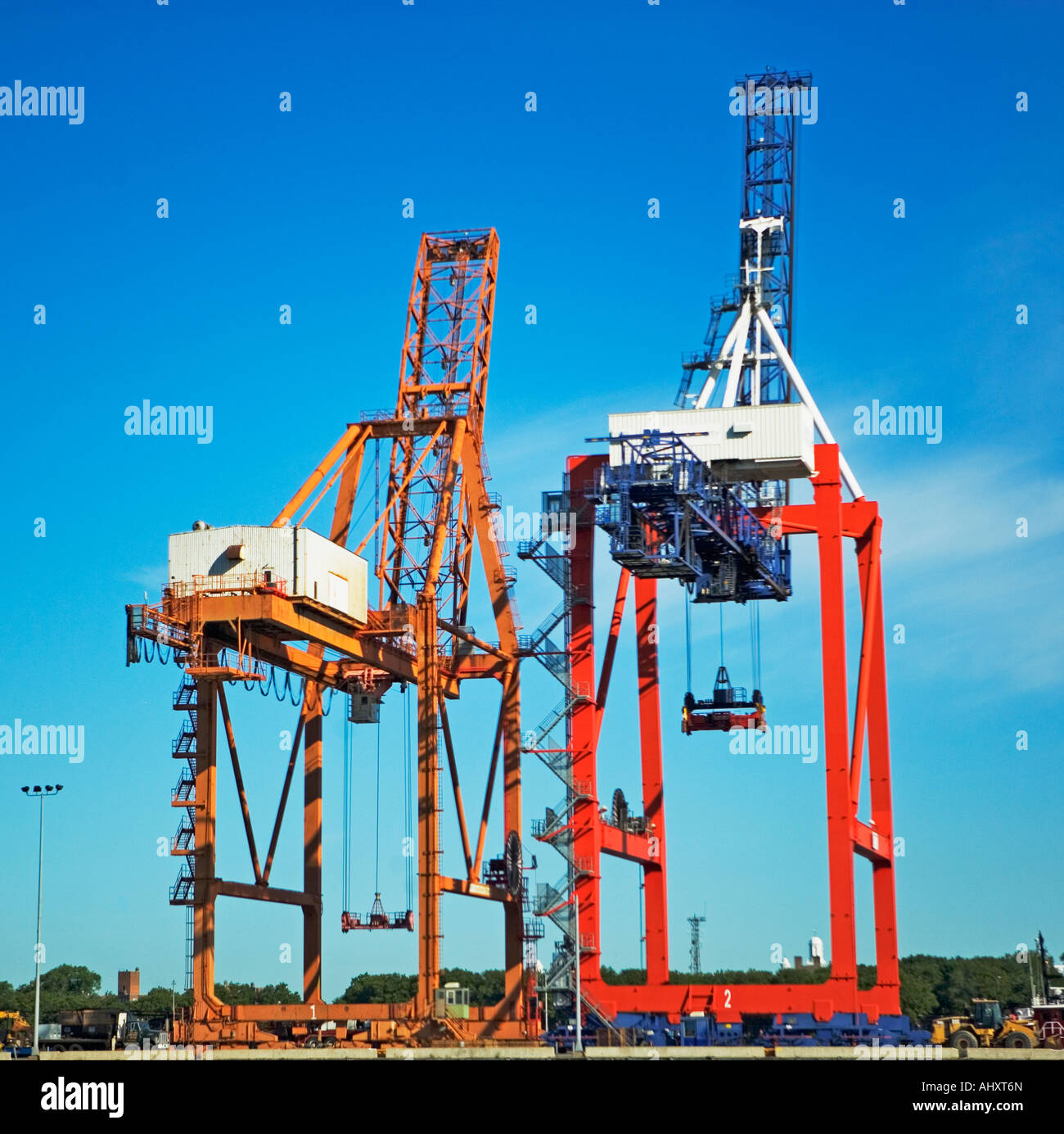Industrial dock equipment and cranes Stock Photo - Alamy