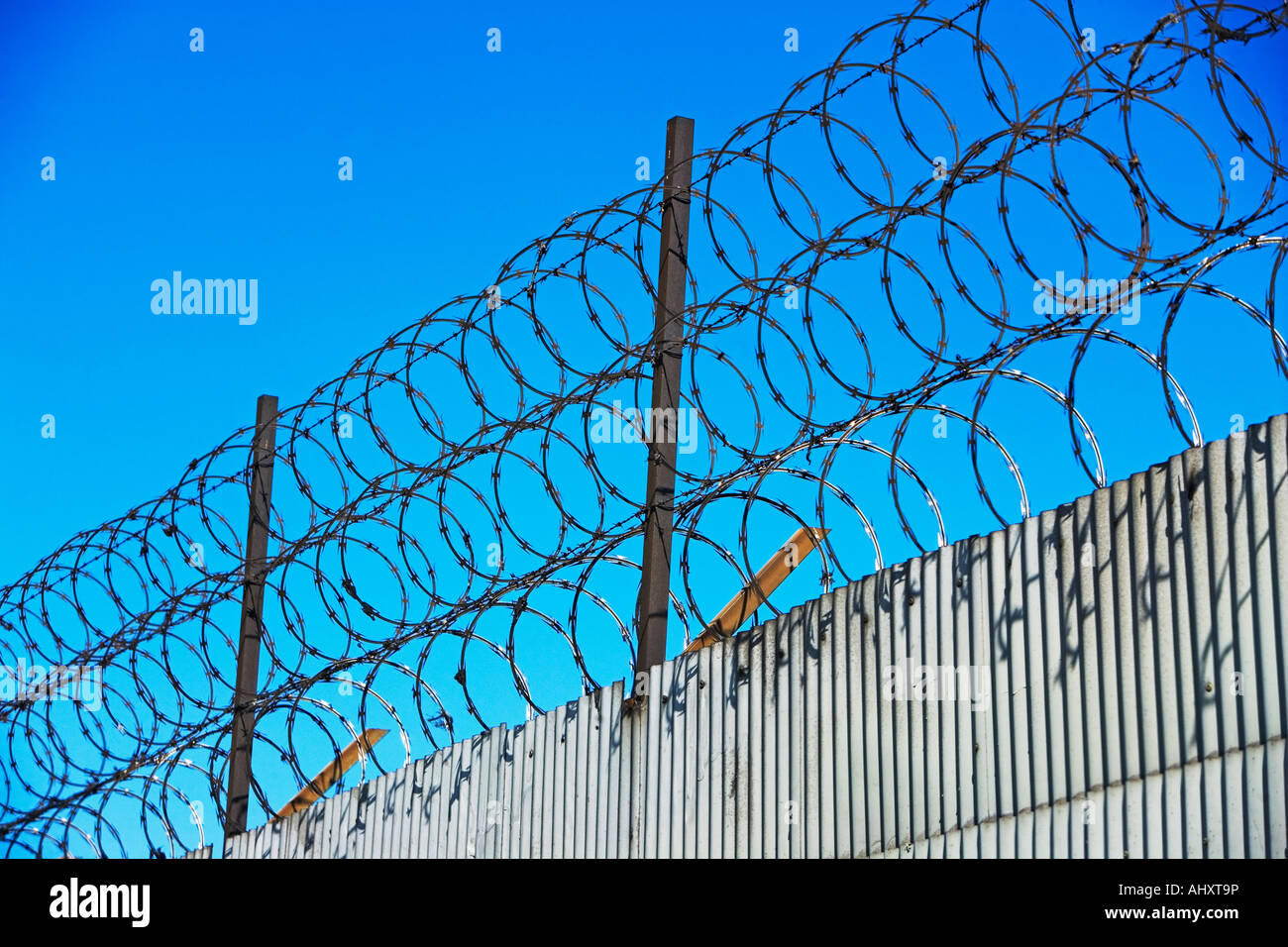 Guarding barbed wire hi-res stock photography and images - Alamy