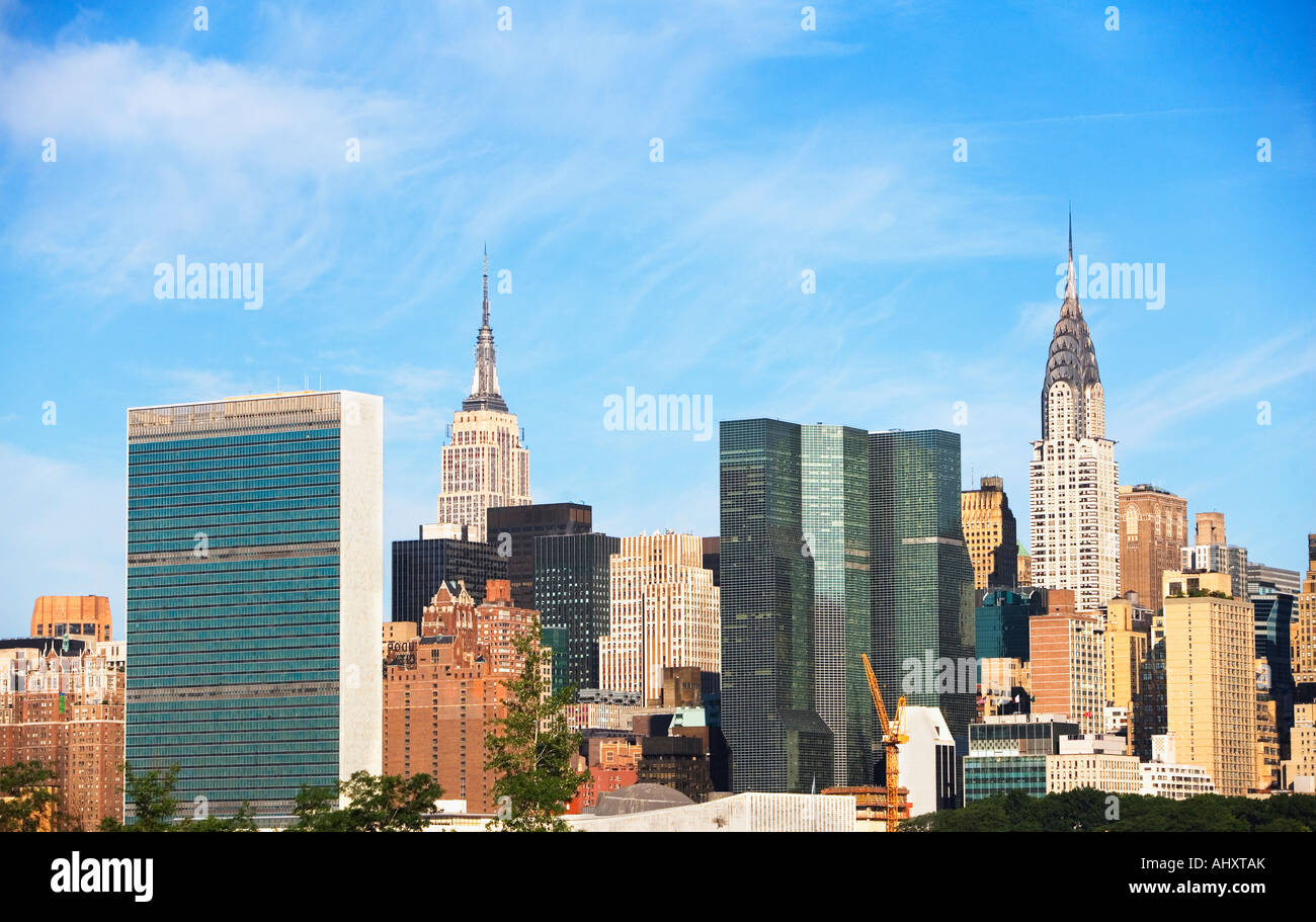 New York City skyline under blue sky Stock Photo - Alamy