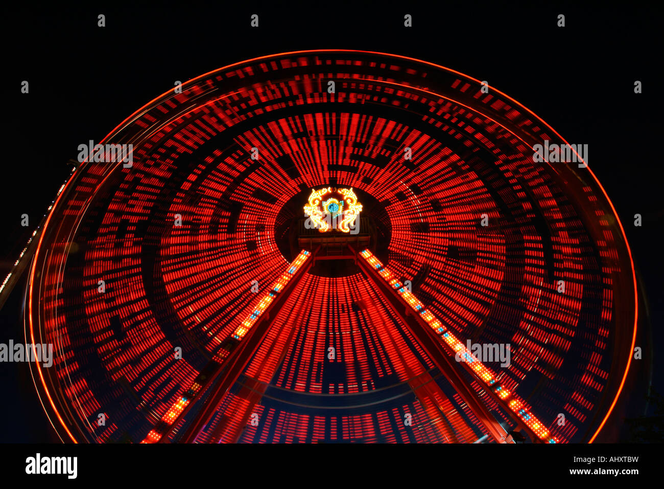 lunapark giant spinning wheel in motion Stock Photo - Alamy