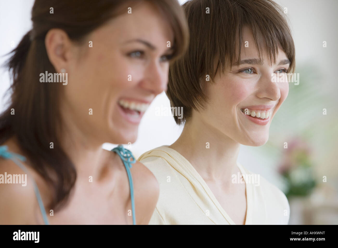 Two women laughing Stock Photo - Alamy
