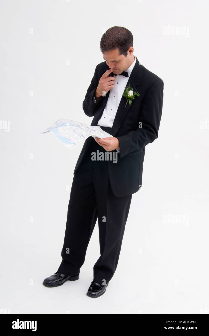 Man looking at road map Stock Photo - Alamy