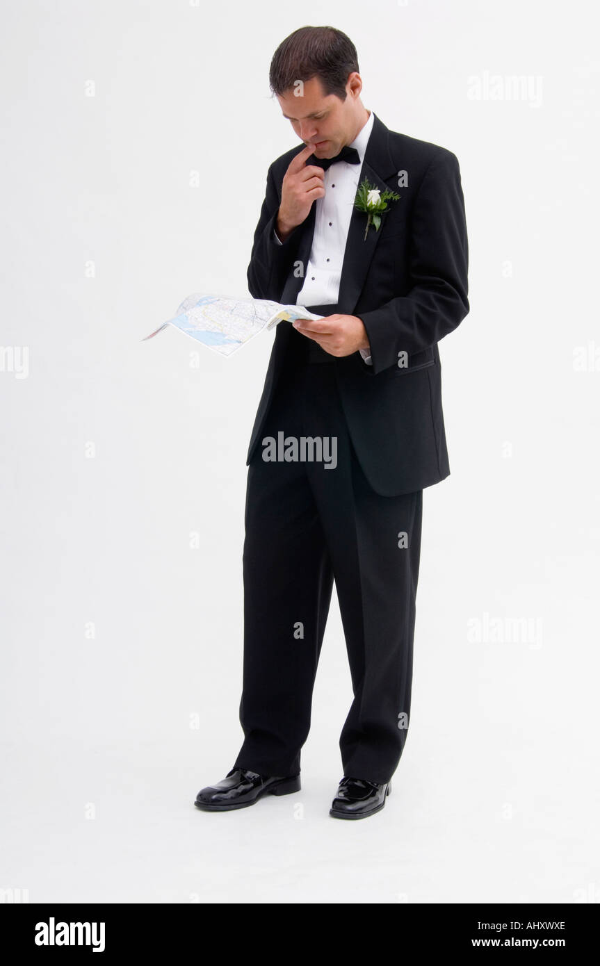 Man looking at road map Stock Photo - Alamy