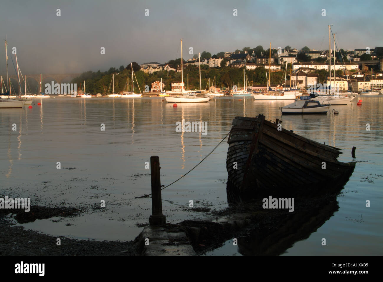 River Tamar wreck and boats reflected in water Plymouth Devon UK Stock ...