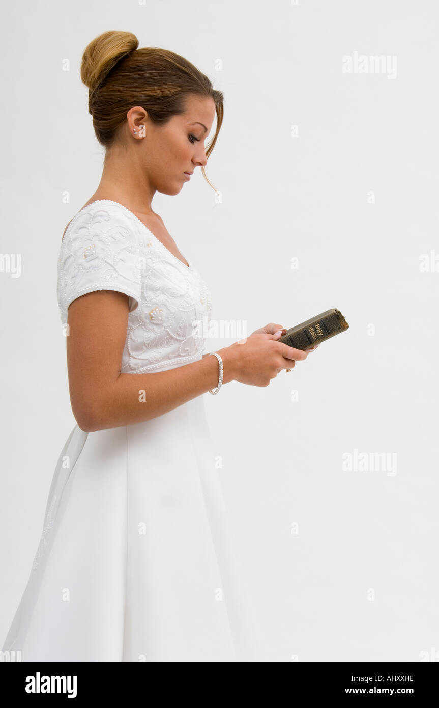 Bride holding Holy Bible Stock Photo - Alamy