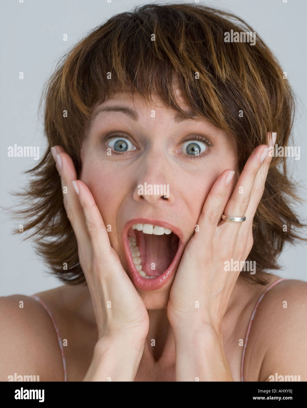 Hands Cheeks Mouth High Resolution Stock Photography and Images - Alamy
