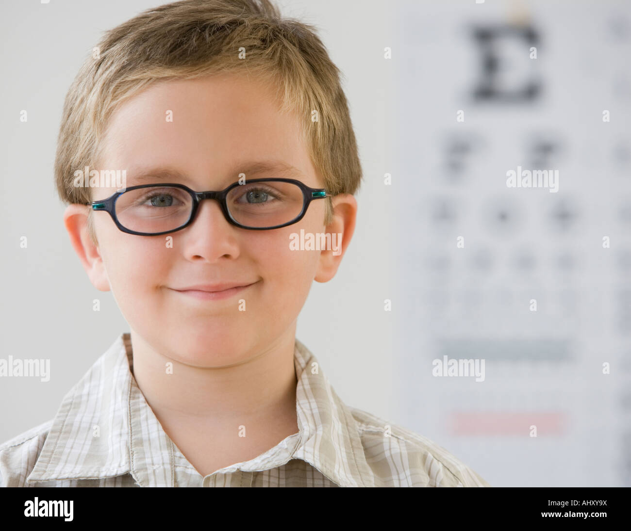 Boy wearing eyeglasses Stock Photo - Alamy