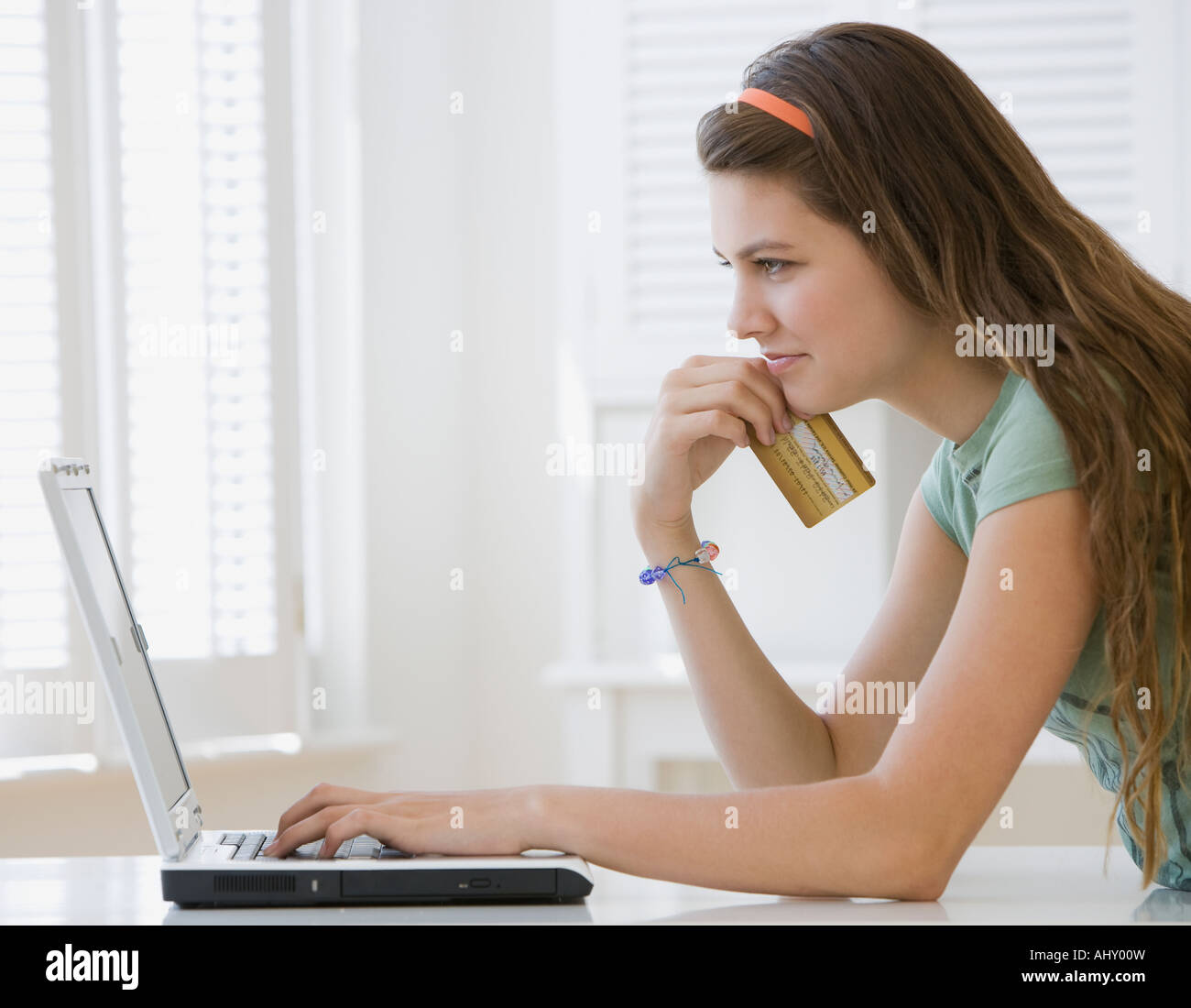 Girl writing in journal Stock Photo - Alamy