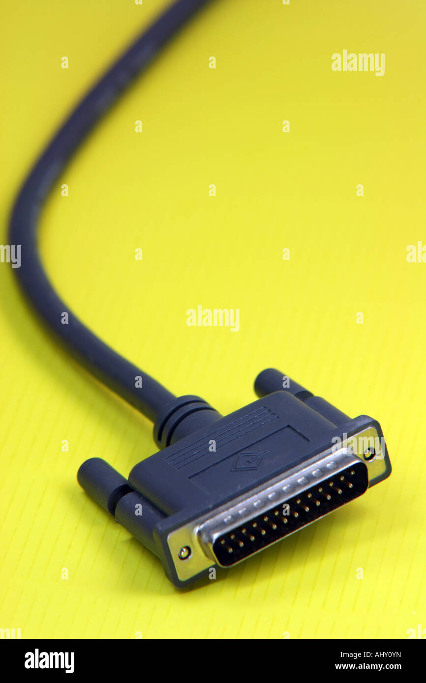 computer connection cable in yellow background Stock Photo - Alamy