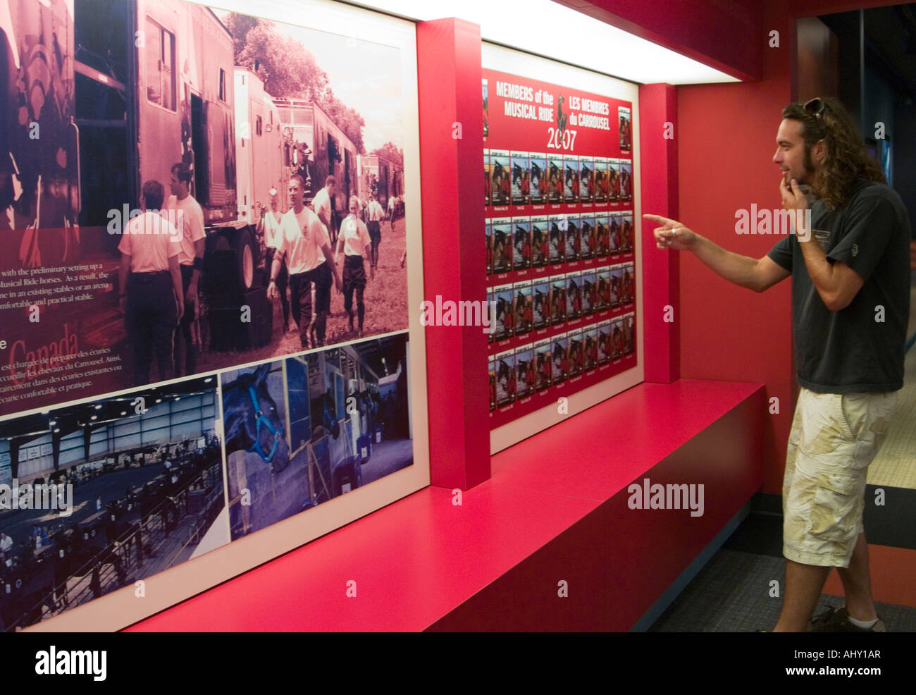A man looks at an exhibit at the RCMP (Royal Canadian Mounted Police ...