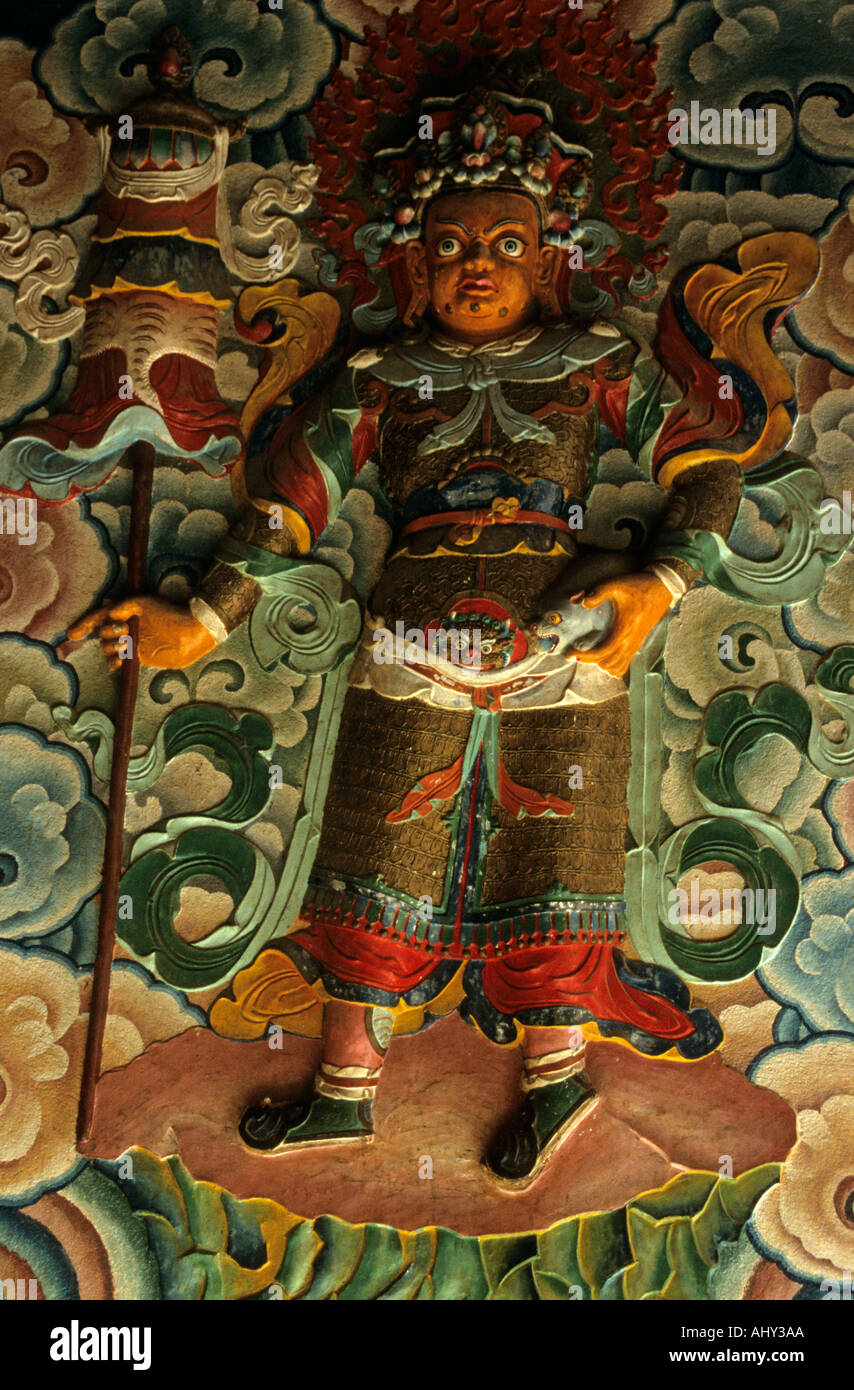Sculpture of Vaisravana guardian of North on the wall on Tibetan ...