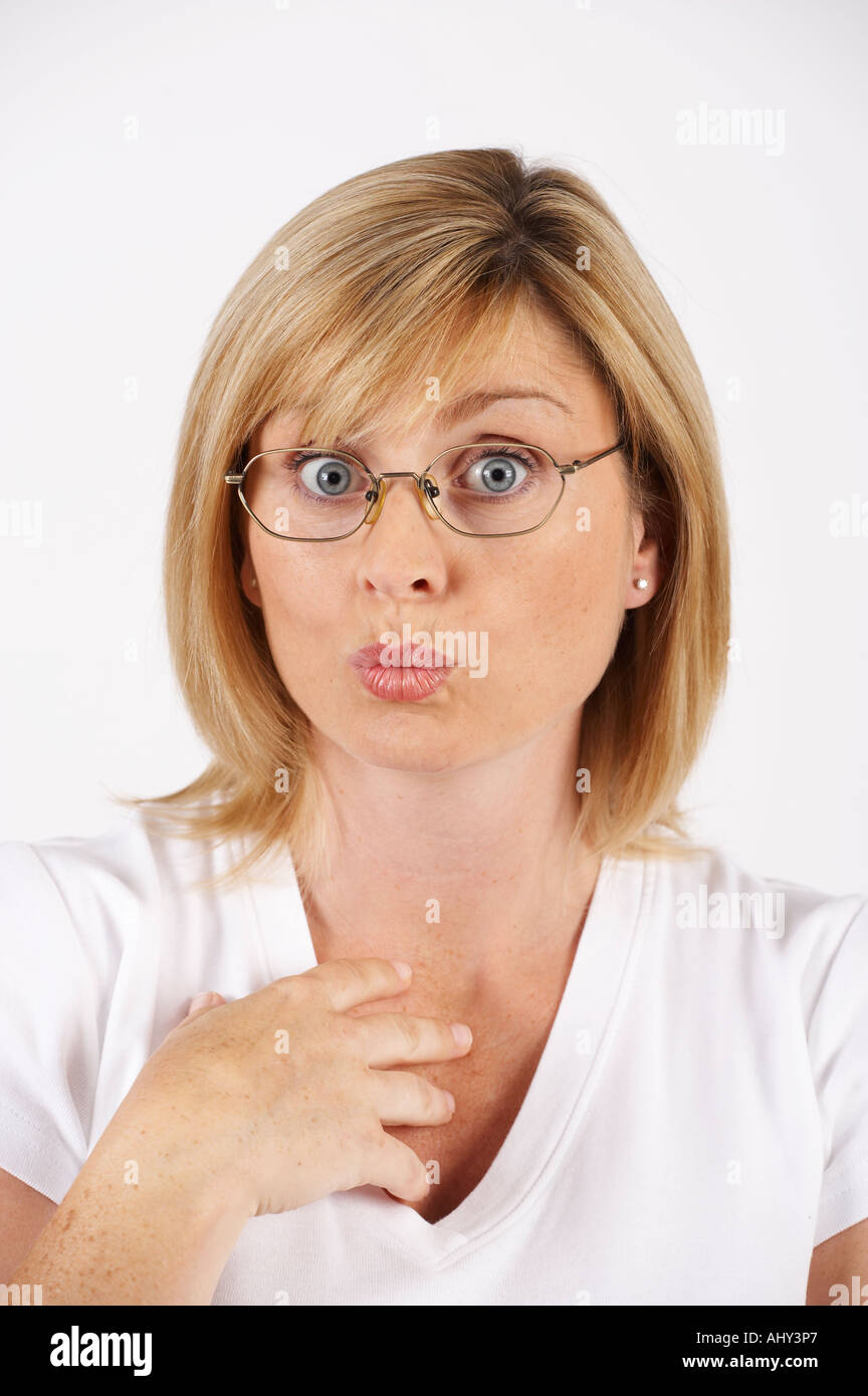 PORTRAIT OF ATTRACTIVE YOUNG BLONDE WOMAN WITH FACIAL EXPRESSION OF ...