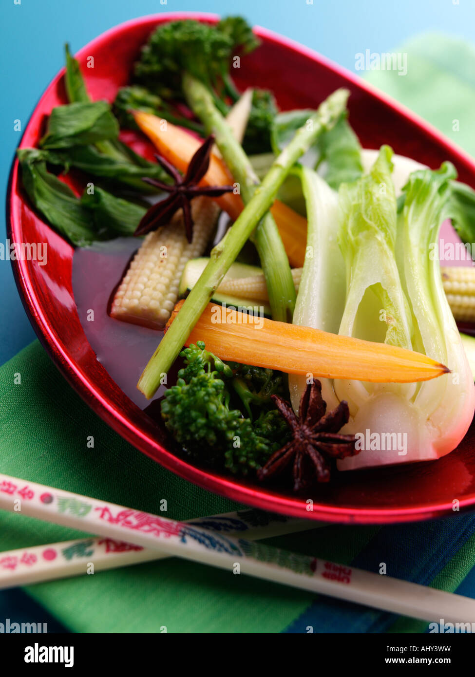 Chinese braised vegetables in a red bowl graphic editorial food image ...