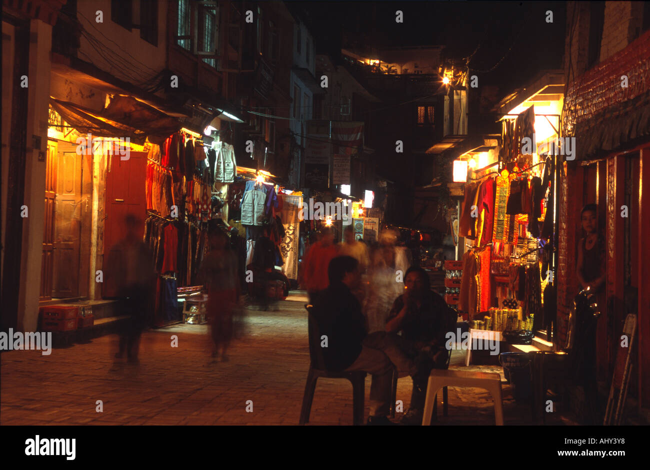 Night scene with Tibetan shops and restaurants near Boudhanath stupa in ...