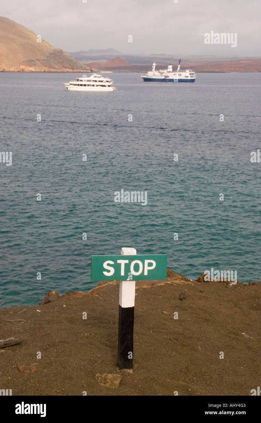 View from tourist trail path past Stop Warning Sign out over cruise ...