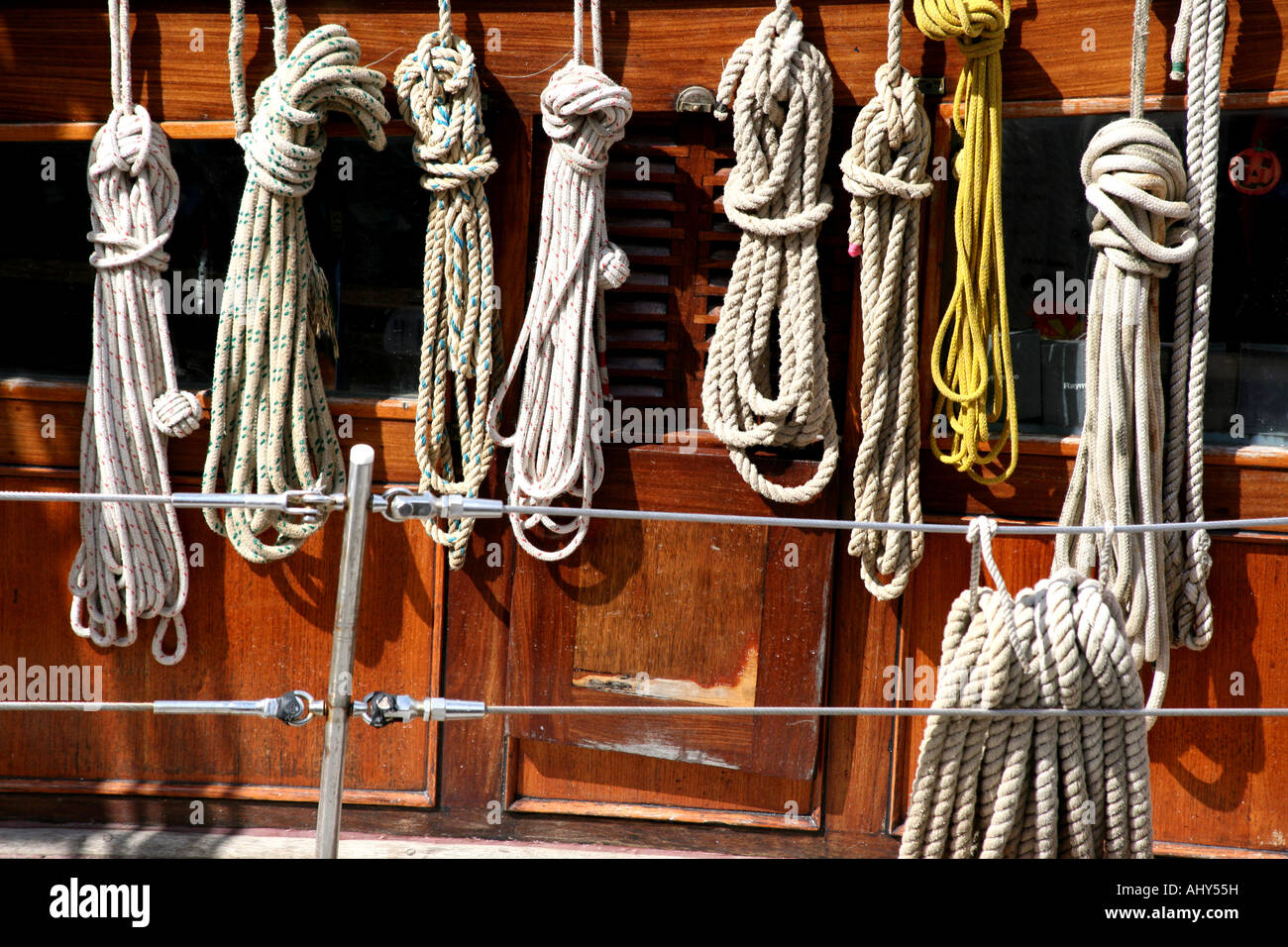 Coiled ropes on old sailing ship Stock Photo - Alamy