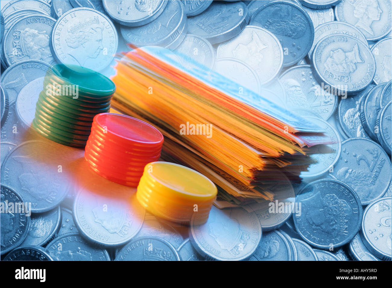 Coins with Gaming Chips and Game Money Stock Photo - Alamy