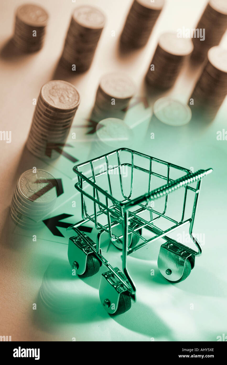 Coins and Miniature Trolley Stock Photo - Alamy