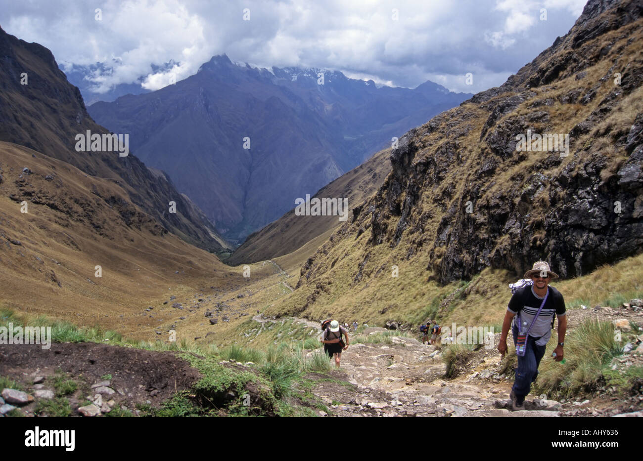 Tourist reaching the summit of Dead Womans Pass, Inca Trail, Peru Stock ...