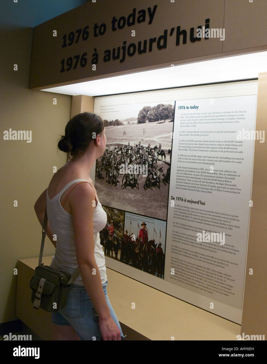 Woman looking at an infomation exhibit at the RCMP (Royal Canadian ...
