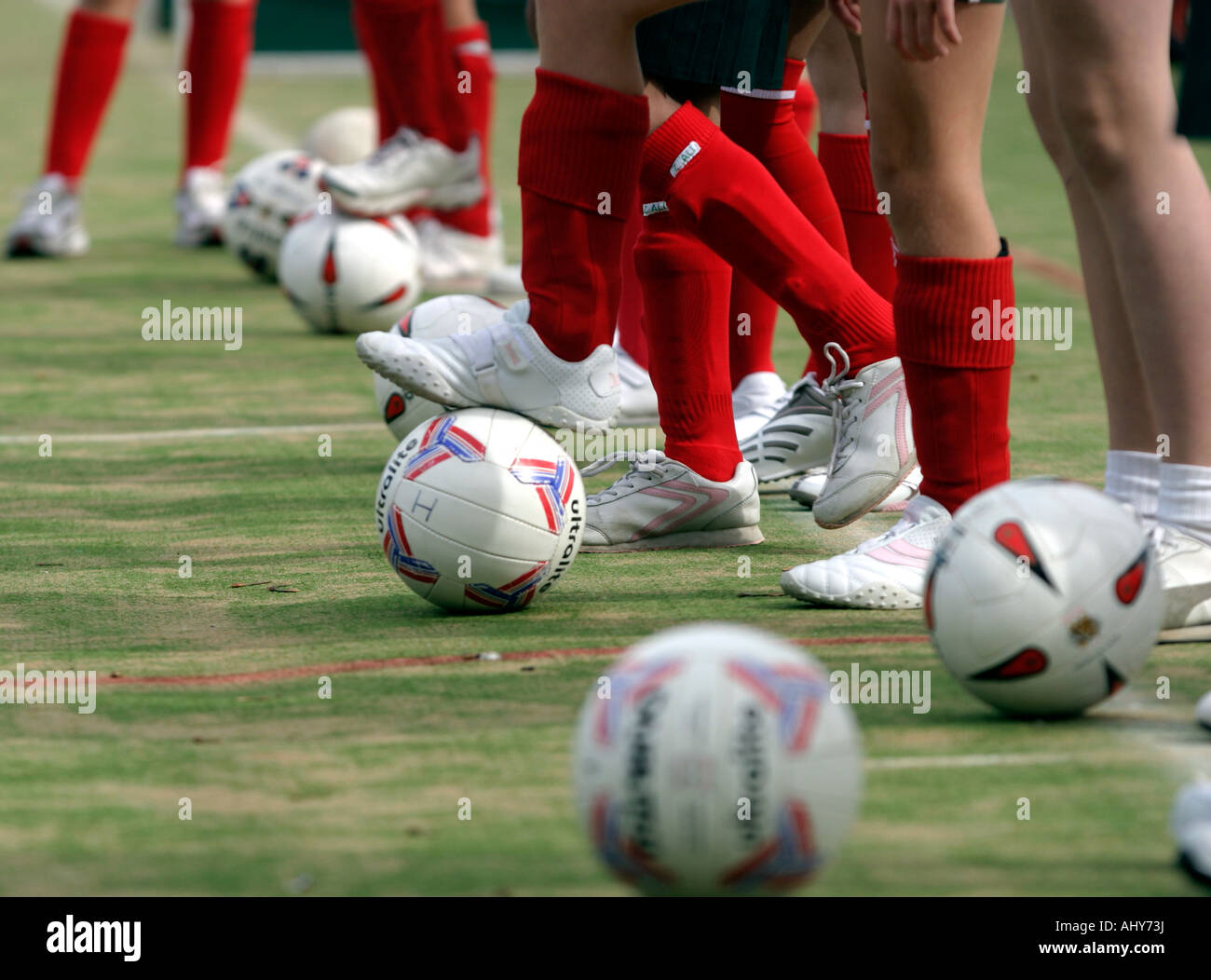 Football at feet hi-res stock photography and images - Alamy