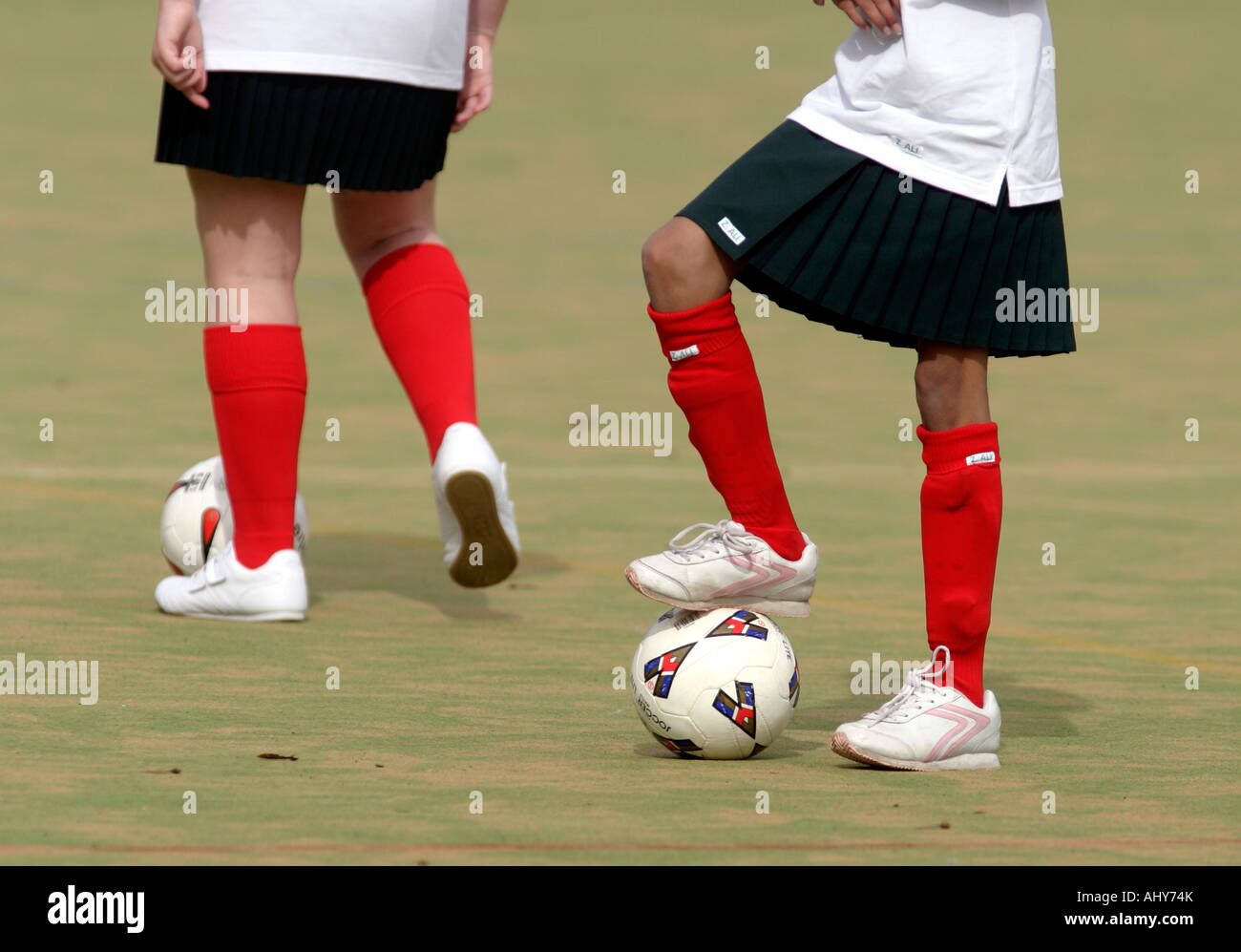 Football, feet, foot, ball, red, white, shoe, boot, trainer Stock Photo ...