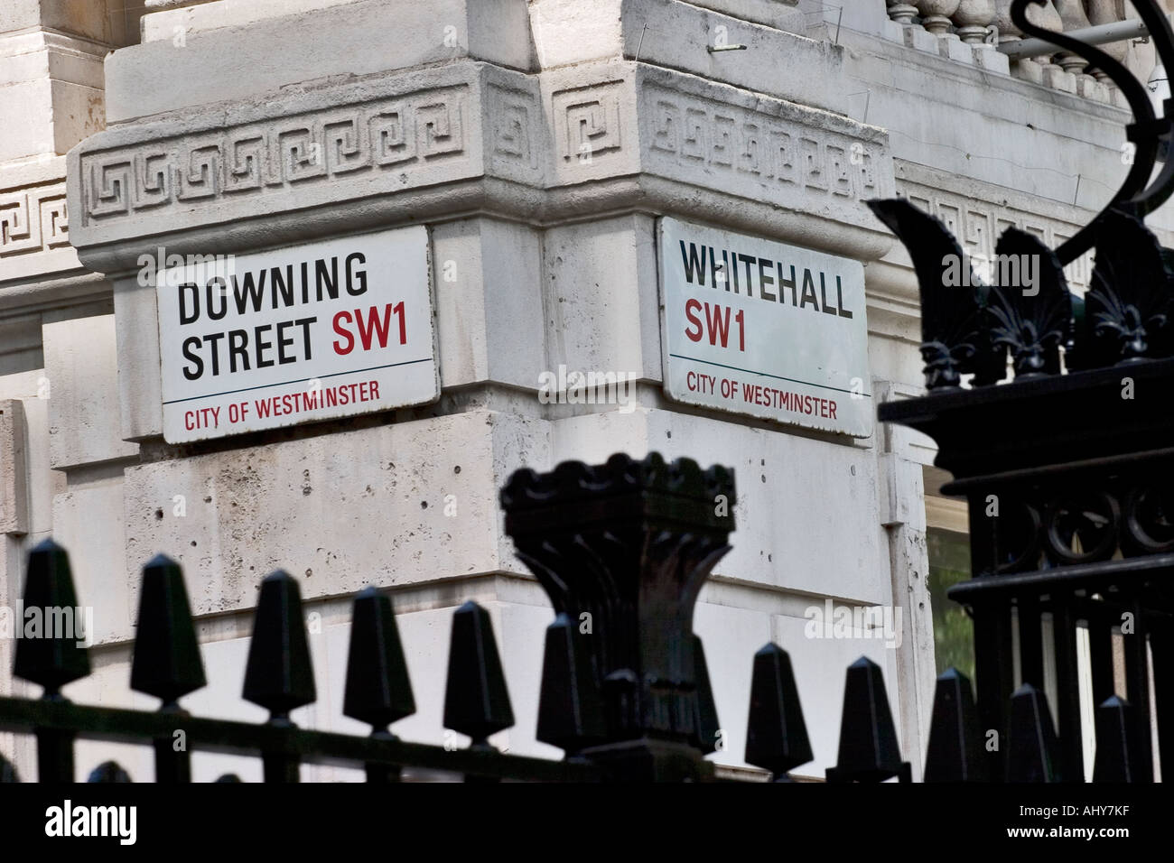 Whitehall and Downing Street signs behing the gates of Downing Street ...