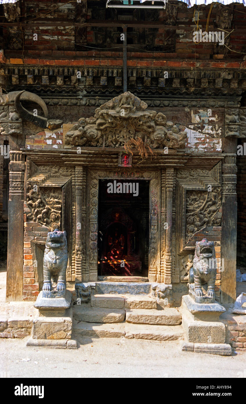 Intricately carved wooden entrance to a Hindu temple in Kathmandu ...