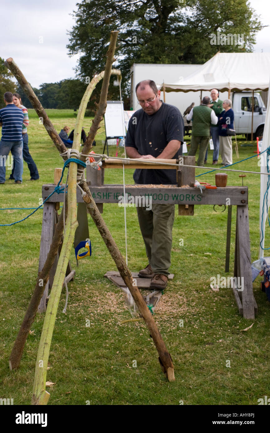 Bodger or woodworker turning a chair leg using a pole lathe Stock Photo ...