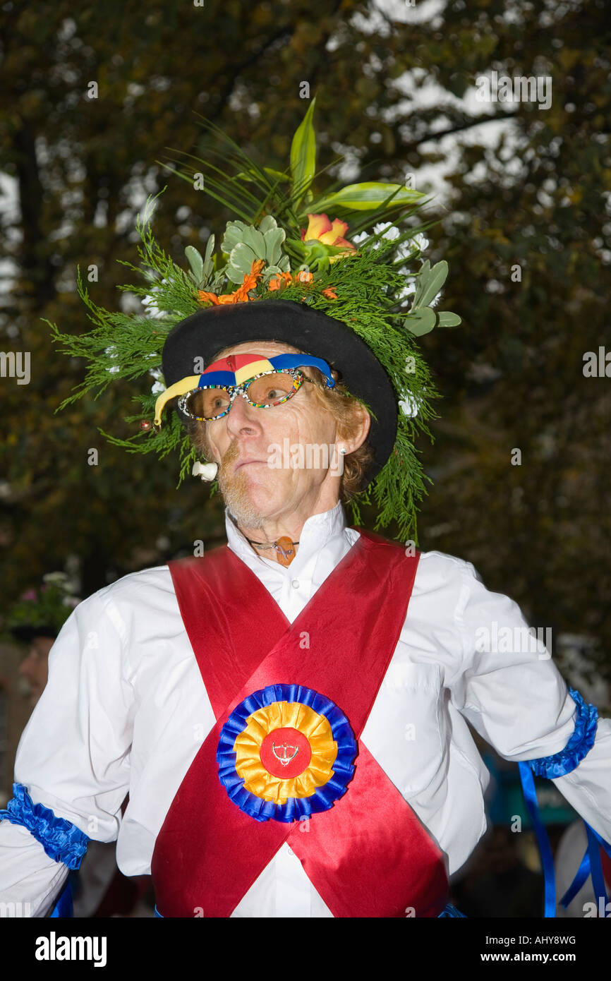 Male Morris Dancer with Red Sash dancing in the Streets of York Stock ...