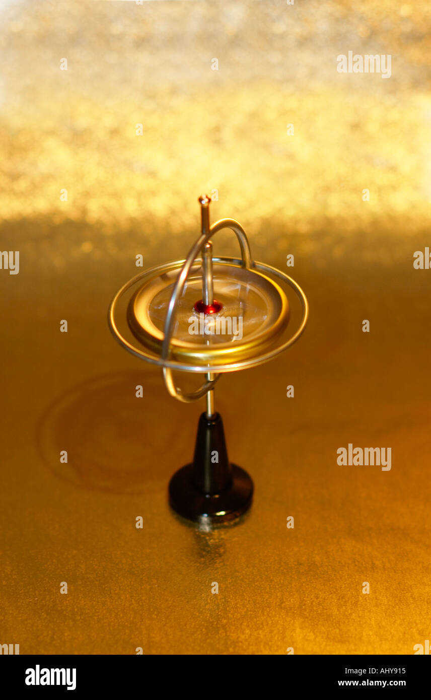 Gyroscope spinning on stand Stock Photo - Alamy