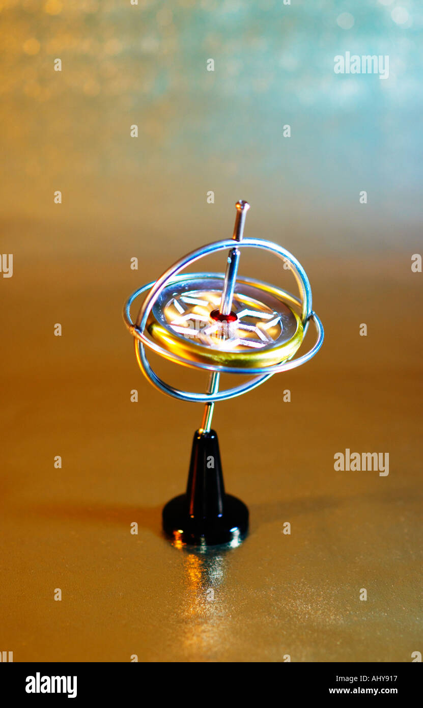 Gyroscope spinning on stand Stock Photo - Alamy