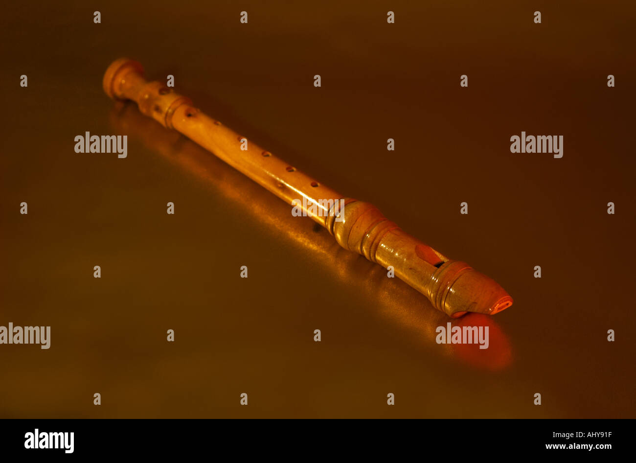 Side lit recorder on plain textured background Stock Photo - Alamy