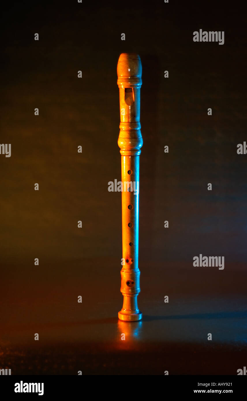 Side lit recorder on plain textured background Stock Photo - Alamy