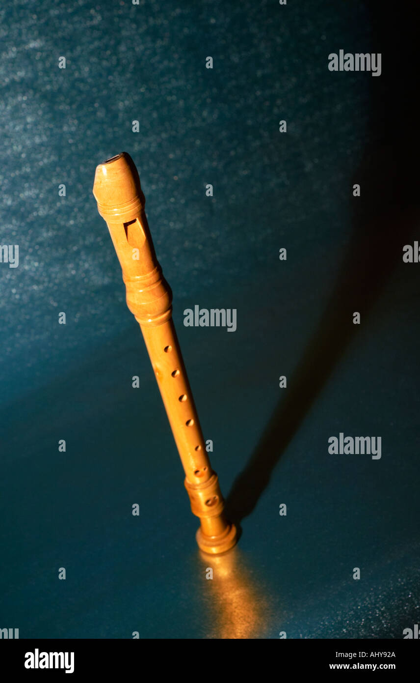 Side lit recorder on plain textured background Stock Photo - Alamy