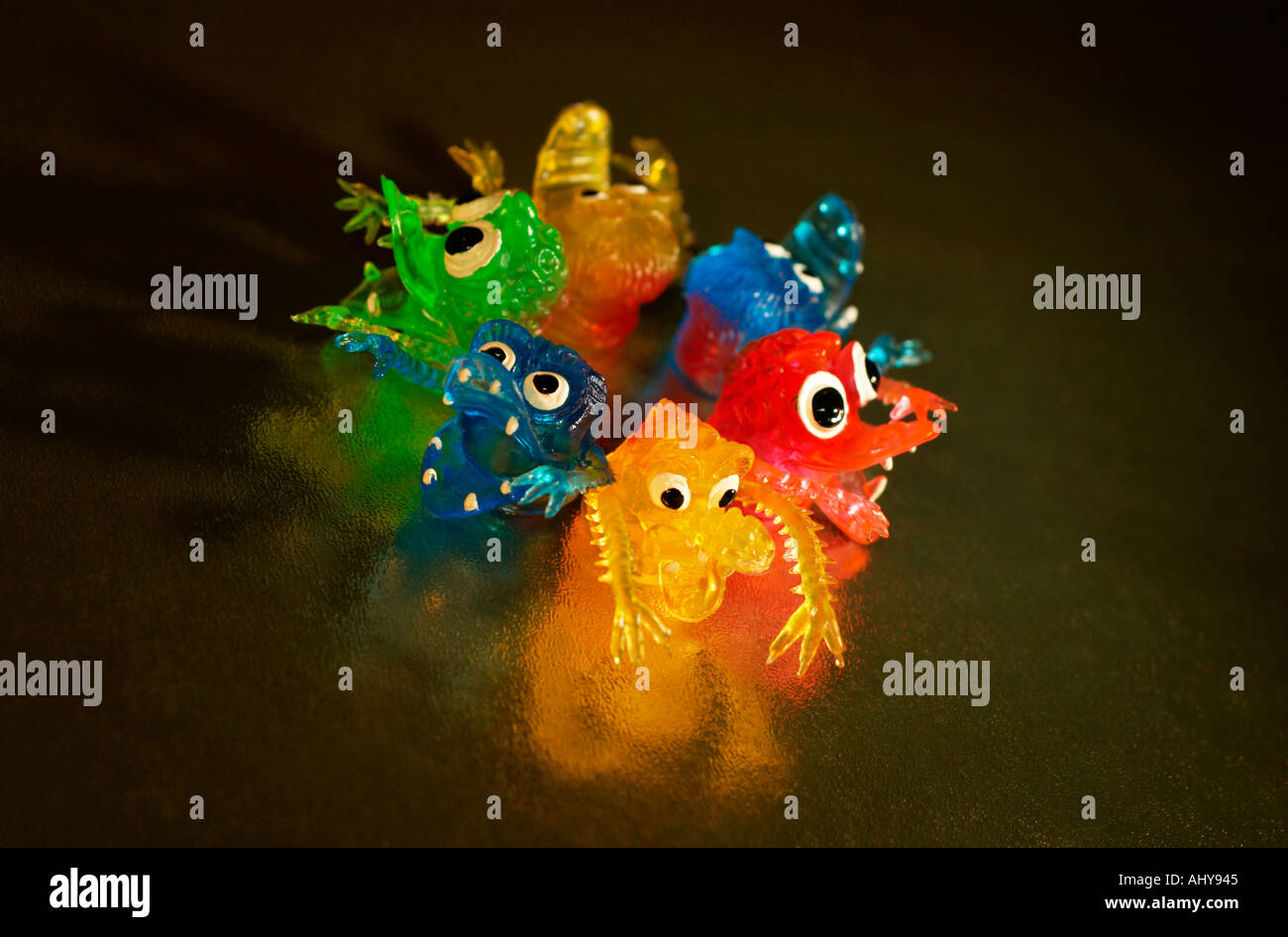 Rubber coloured monsters in group Stock Photo - Alamy